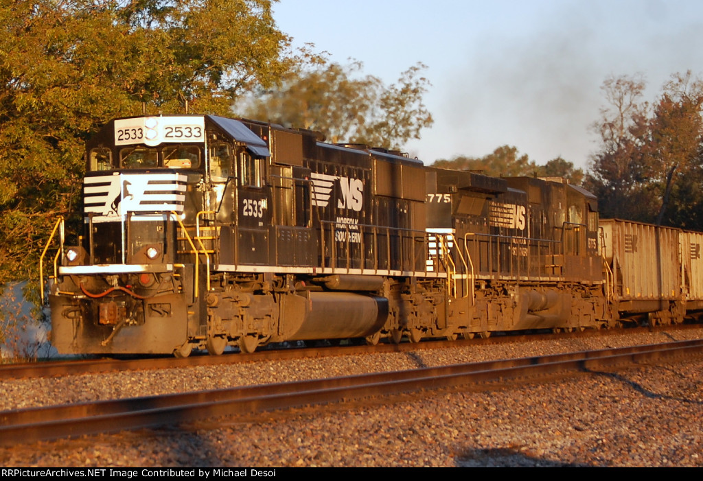 NS SD-70 #2533 is about to cross Main St. with this early morning eastbound coal train